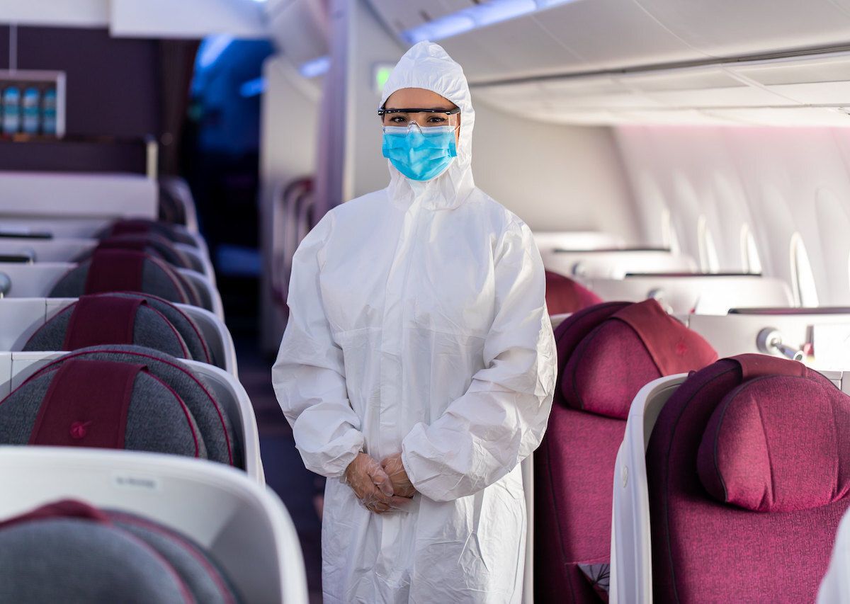 Qatar Airways flight attendants will wear full PPE gear